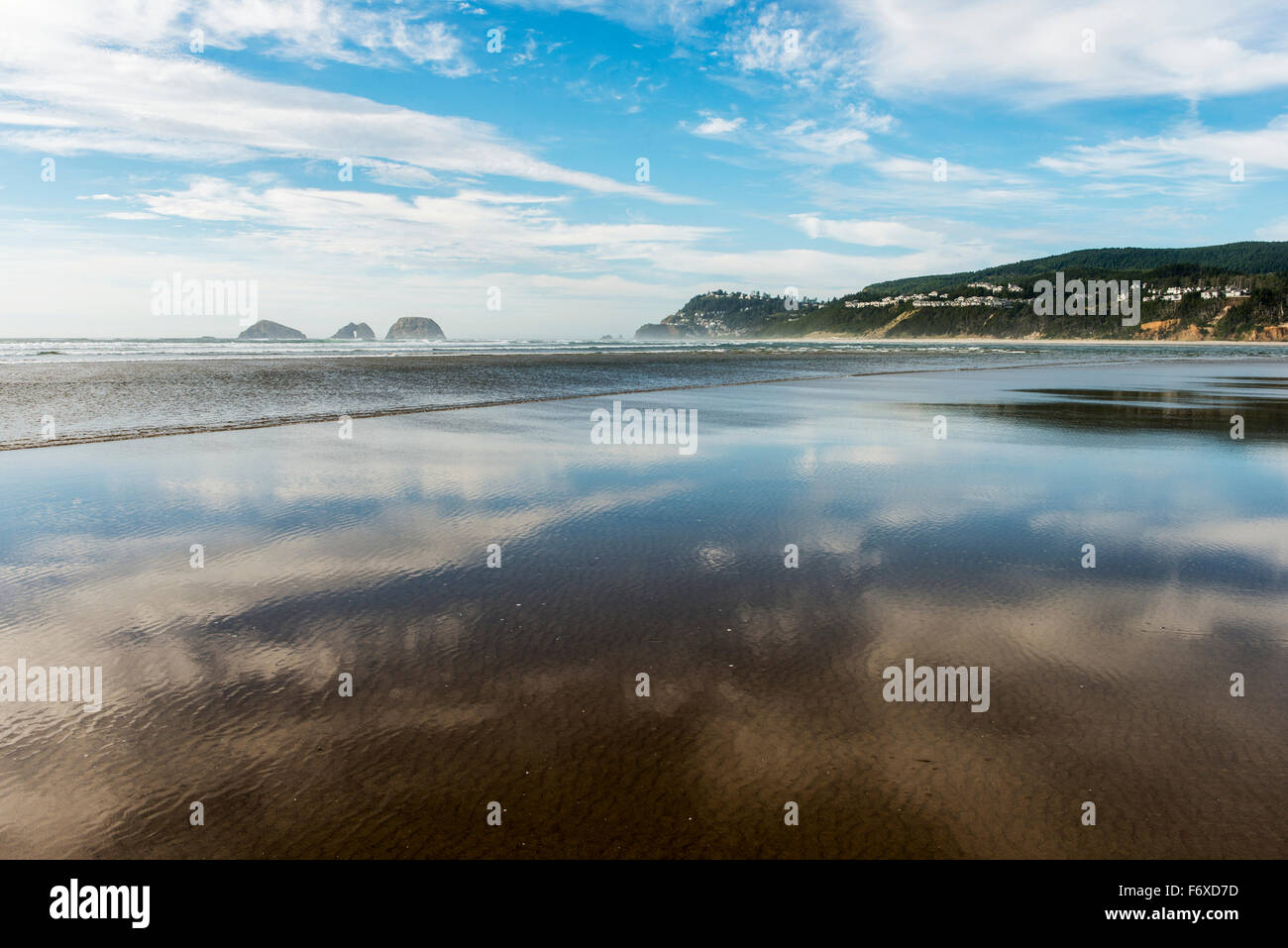 The beach reflects near Netarts Bay on the Oregon Coast; Netarts ...