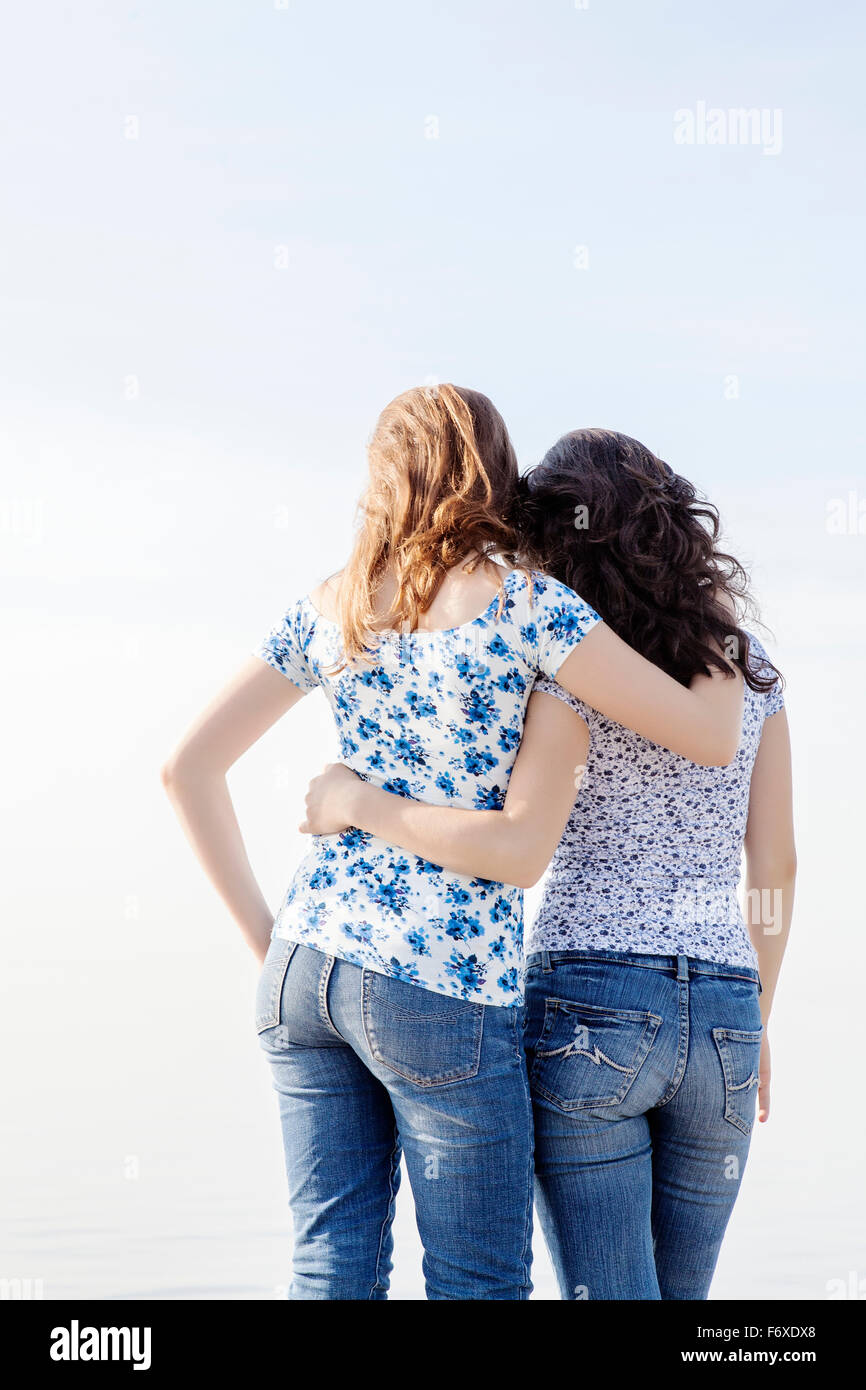Two Girls With Their Arms Around Each Other Toronto Ontario Canada