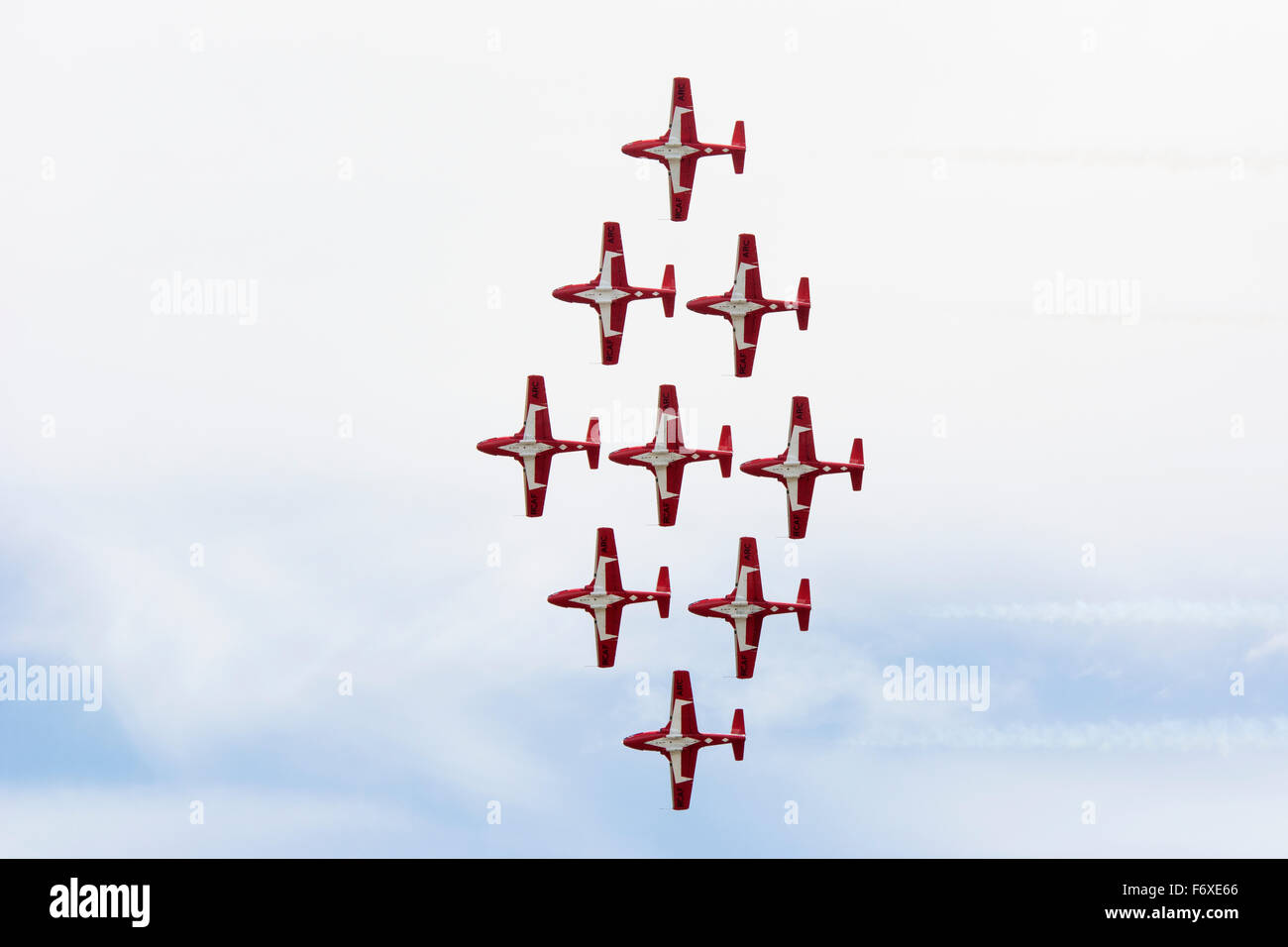 Red demonstration military jet in diamond formation; Lethbridge ...