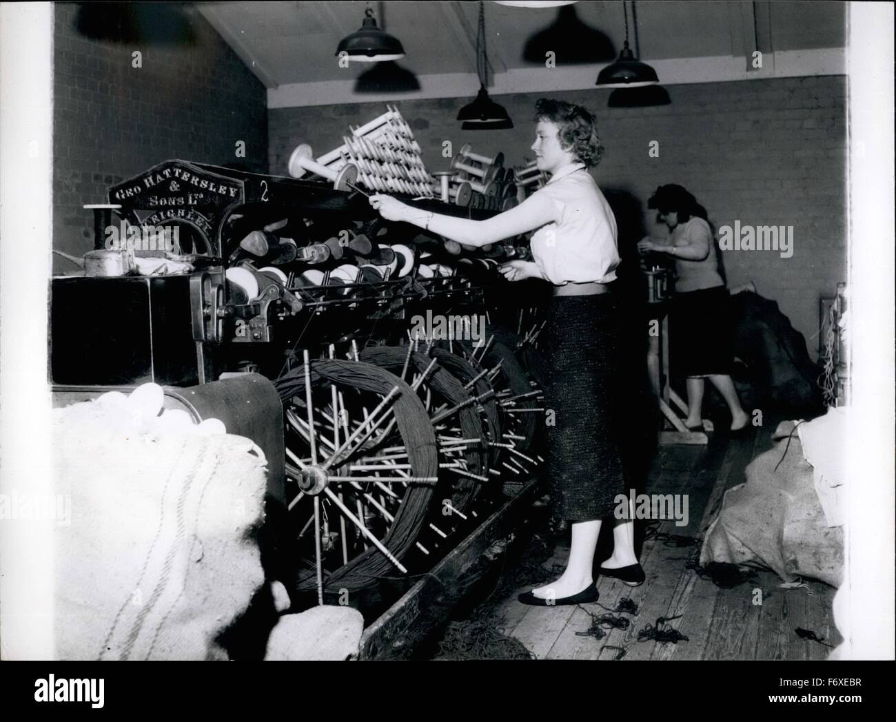 1952 - Freshly-Dyed wools for the Spinners: assistants fill the spools ...