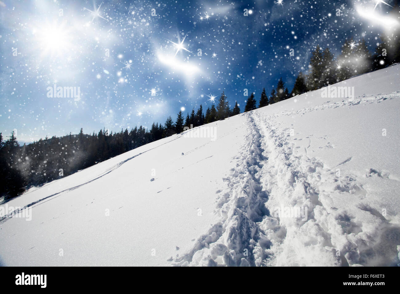 Christmas background with snowy path on the hillside Stock Photo - Alamy