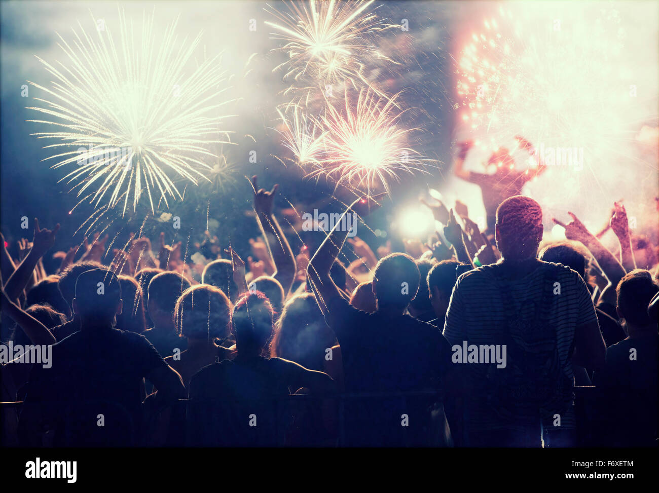 Crowd watching fireworks and celebrating New Year Stock Photo - Alamy