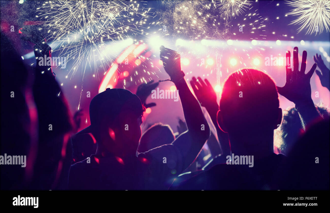 Crowd watching fireworks and celebrating New Year Stock Photo - Alamy