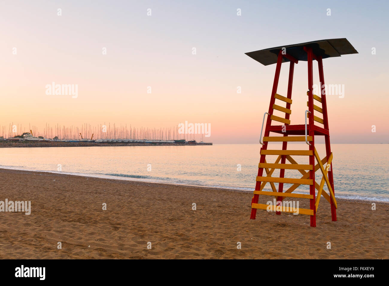Lifeguard tower on a beach in Palaio Faliro and dry dock of Alimos ...