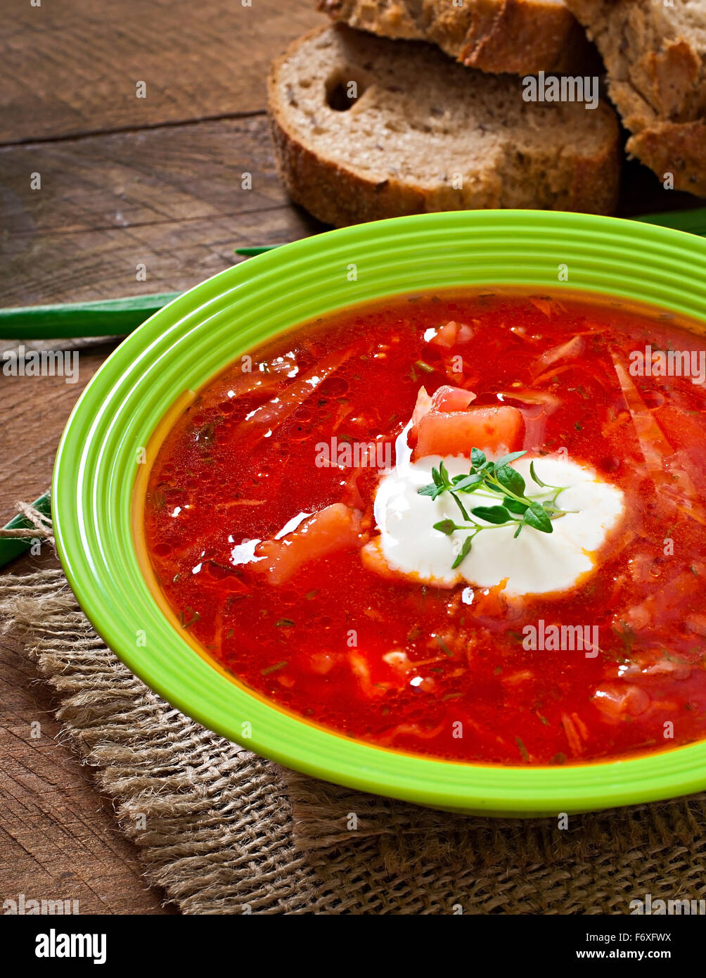 Traditional Ukrainian Russian vegetable borscht soup on the old wooden ...