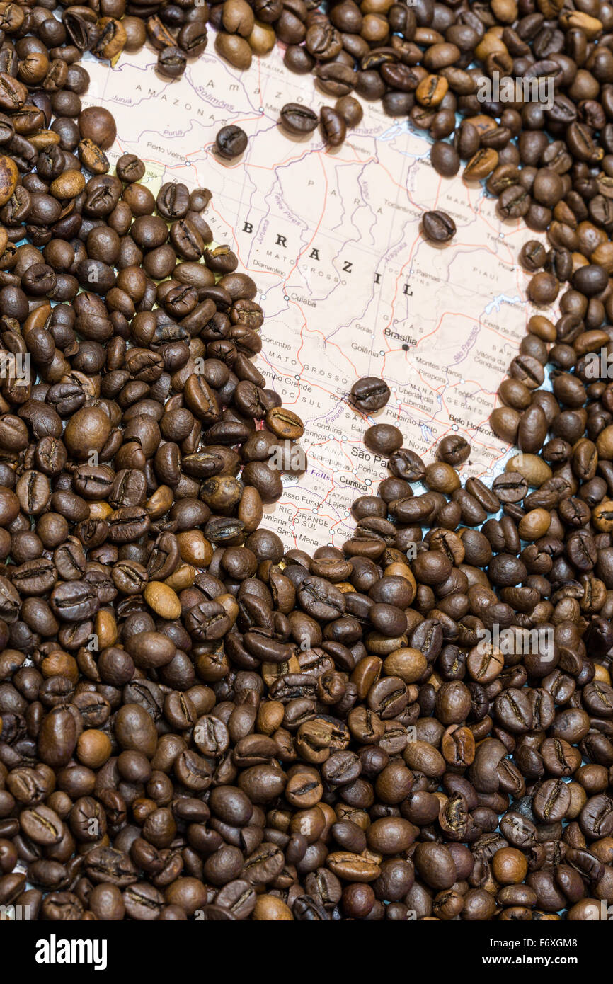 Geographical map of Brazil covered by a background of roasted coffee ...