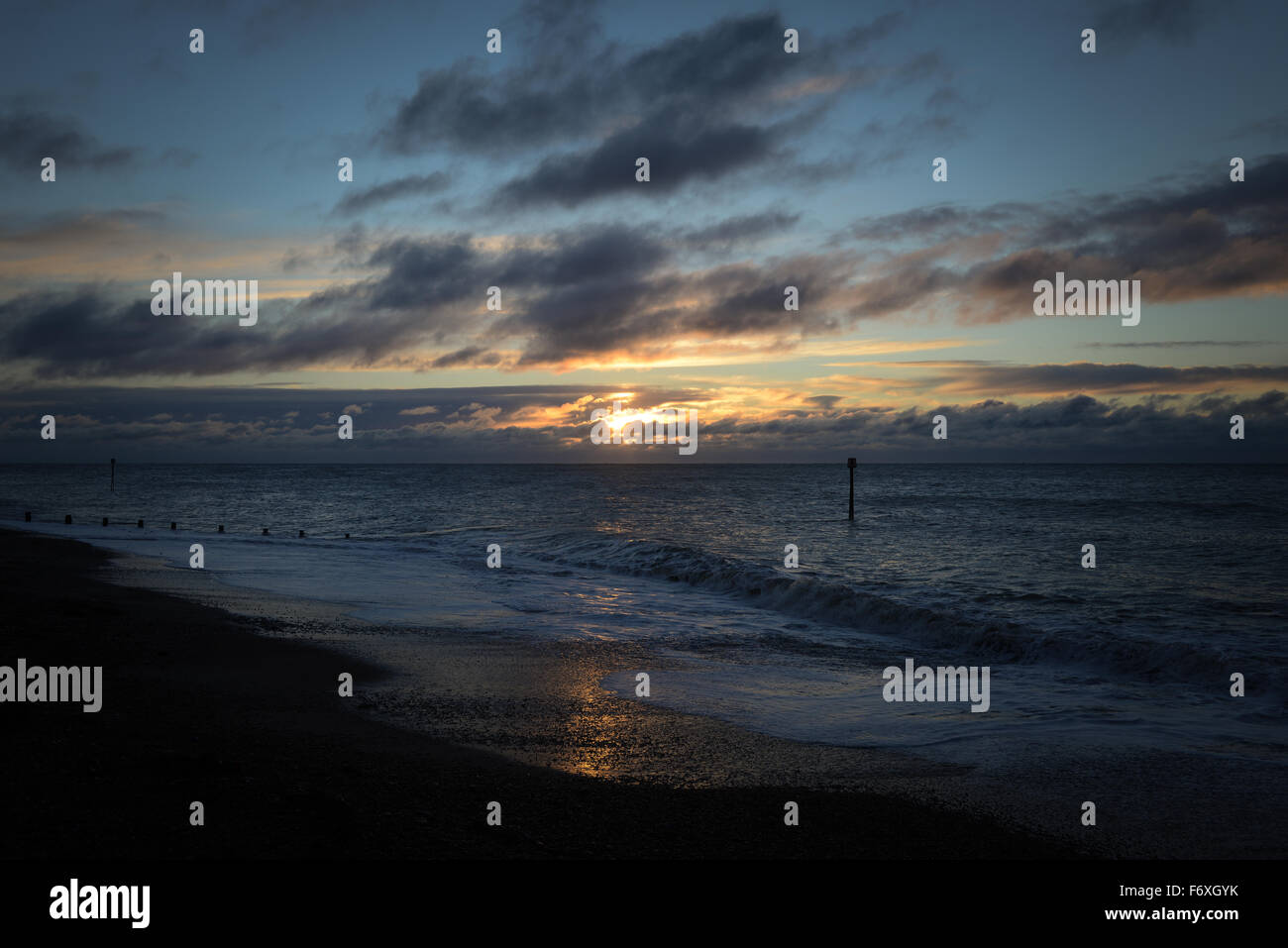 A beautiful sunrise over the English Channel taken from the beach in ...