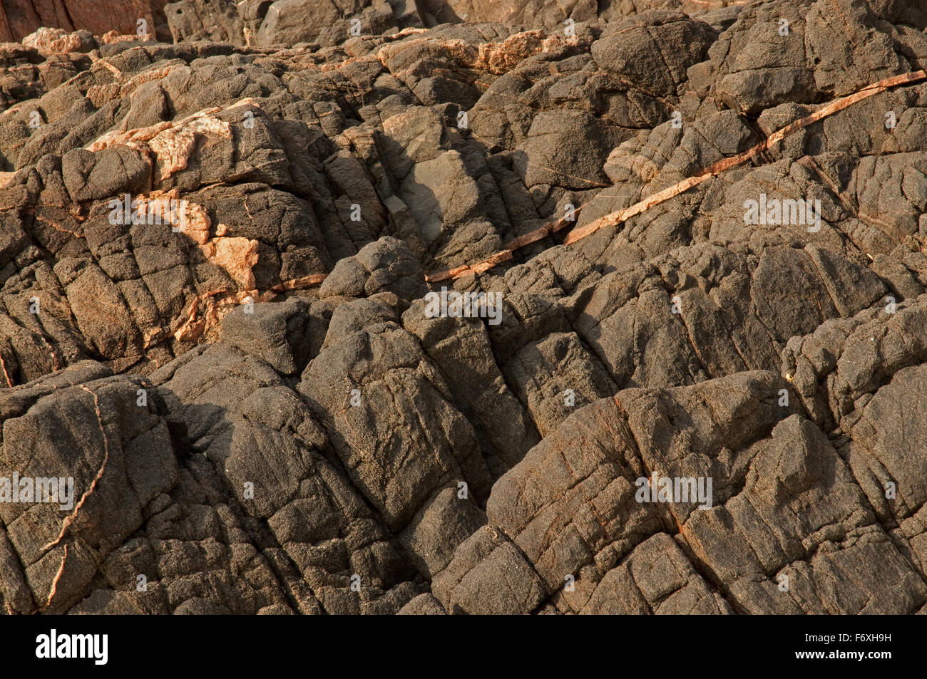 Basalt and Granite rock at Oldshoremore Bay Stock Photo - Alamy