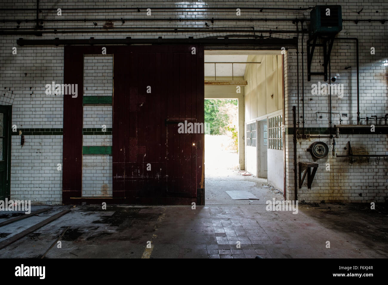 inside view of a deserted run down building Stock Photo - Alamy