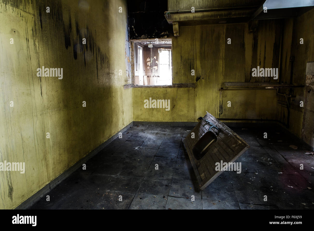 inside view of a deserted run down building Stock Photo - Alamy