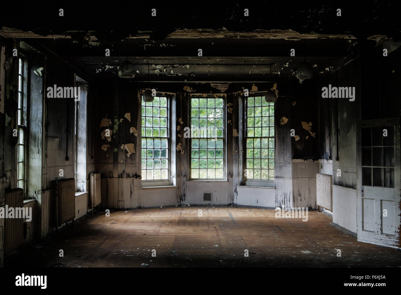 inside view of a deserted run down building Stock Photo - Alamy