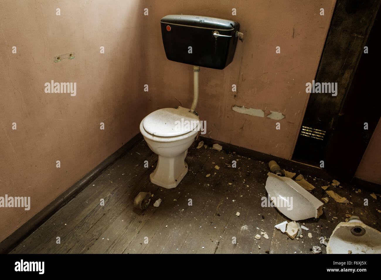 inside view of an old building with a broken loo Stock Photo - Alamy