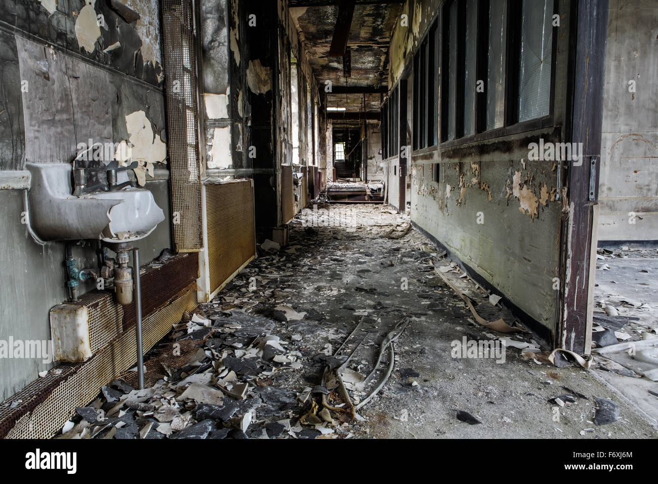 inside view of a deserted run down building after a fire Stock Photo ...