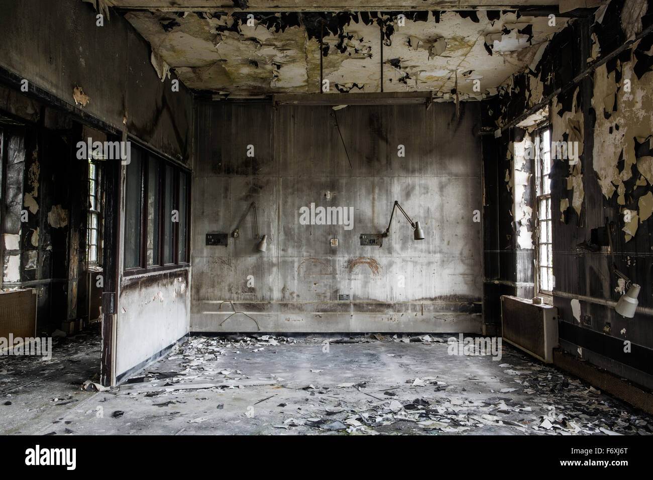 inside view of a deserted run down building after a fire Stock Photo ...