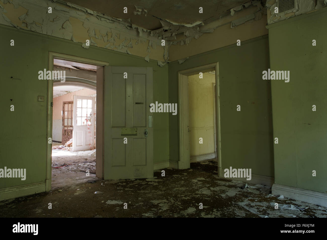 inside view of a deserted run down building Stock Photo - Alamy