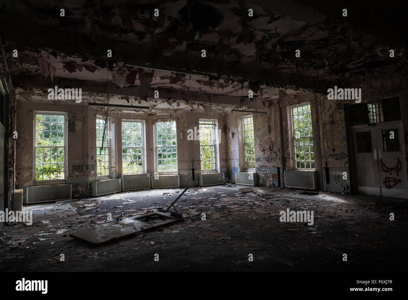 inside view of a deserted run down building Stock Photo - Alamy