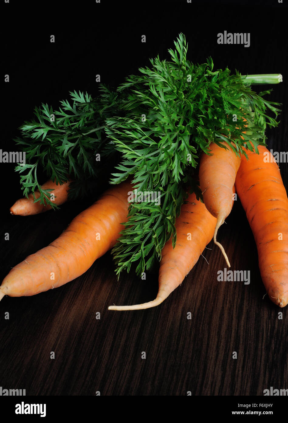 Raw carrots haulm hi-res stock photography and images - Alamy