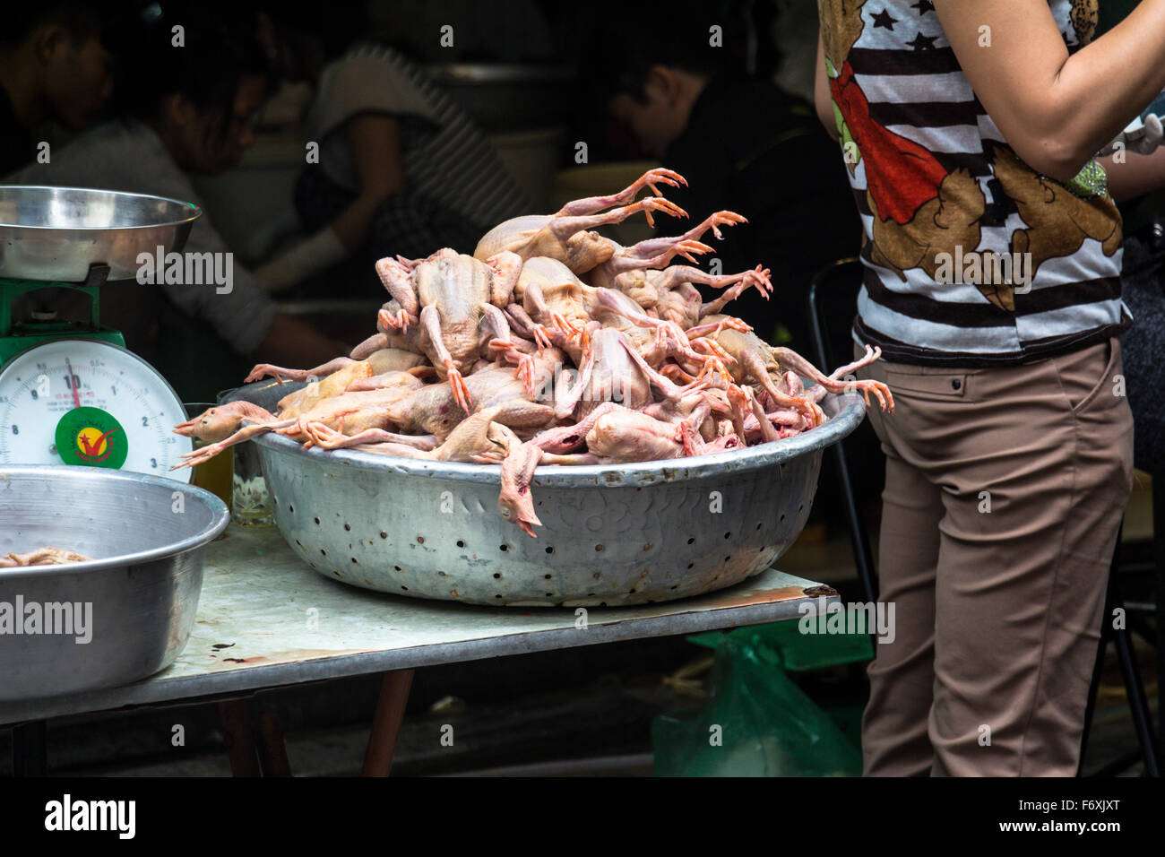 Raw chicken on street in Hanoi Stock Photo - Alamy