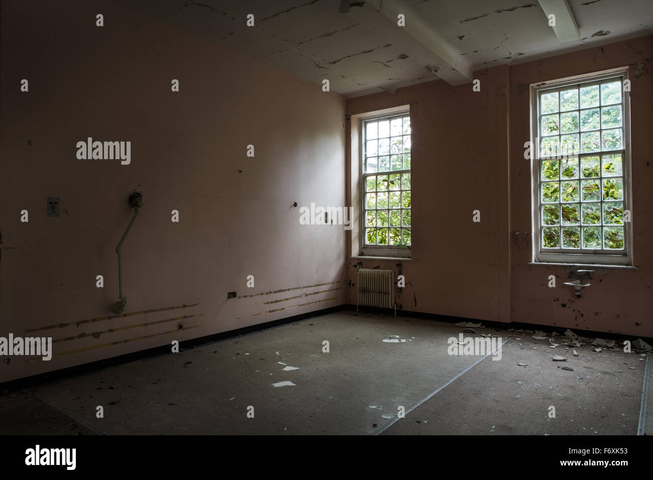 inside view of a deserted run down building Stock Photo - Alamy