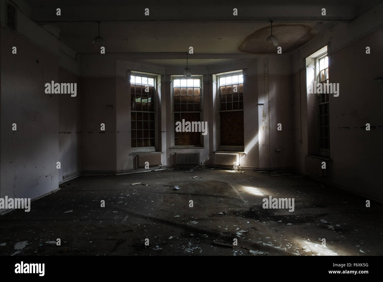 inside view of a deserted run down building Stock Photo - Alamy