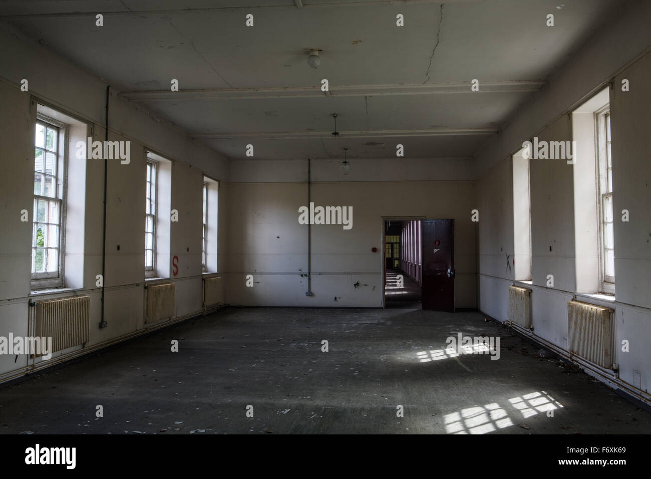 inside view of a deserted run down building Stock Photo - Alamy
