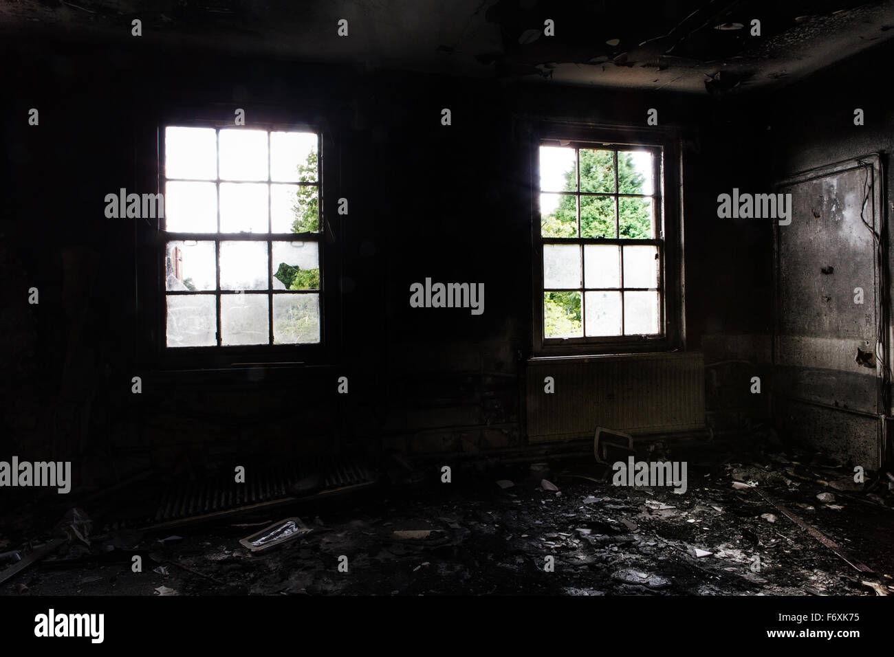 inside view of a deserted run down building Stock Photo - Alamy