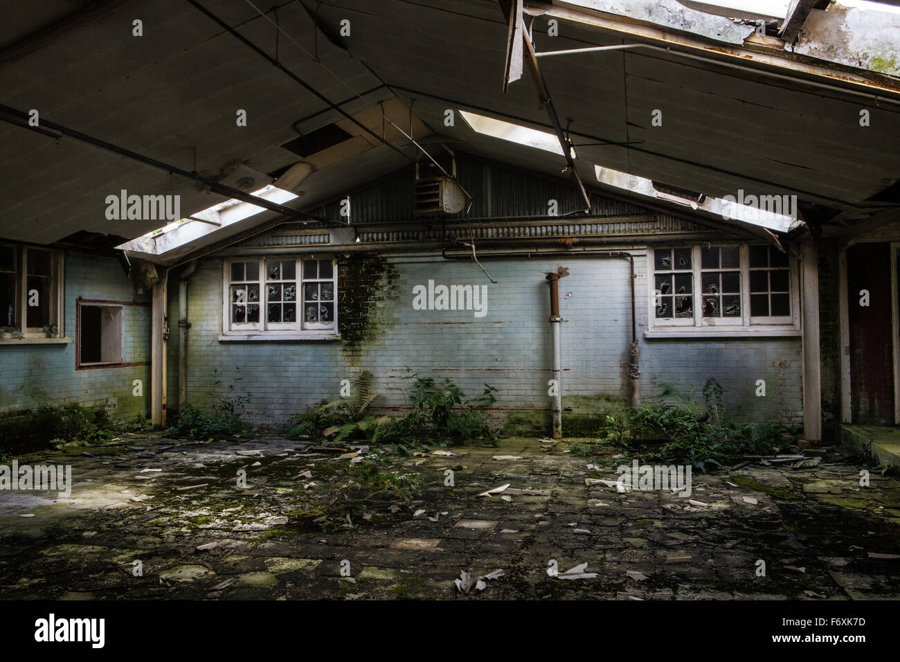 inside view of a deserted run down building Stock Photo - Alamy