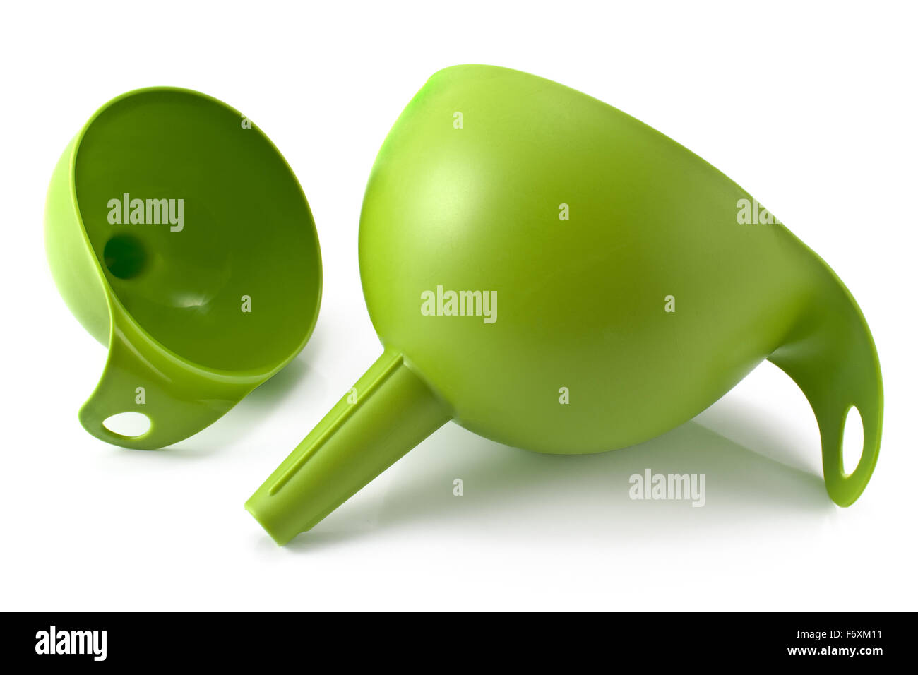 Green funnel isolated on white Stock Photo - Alamy