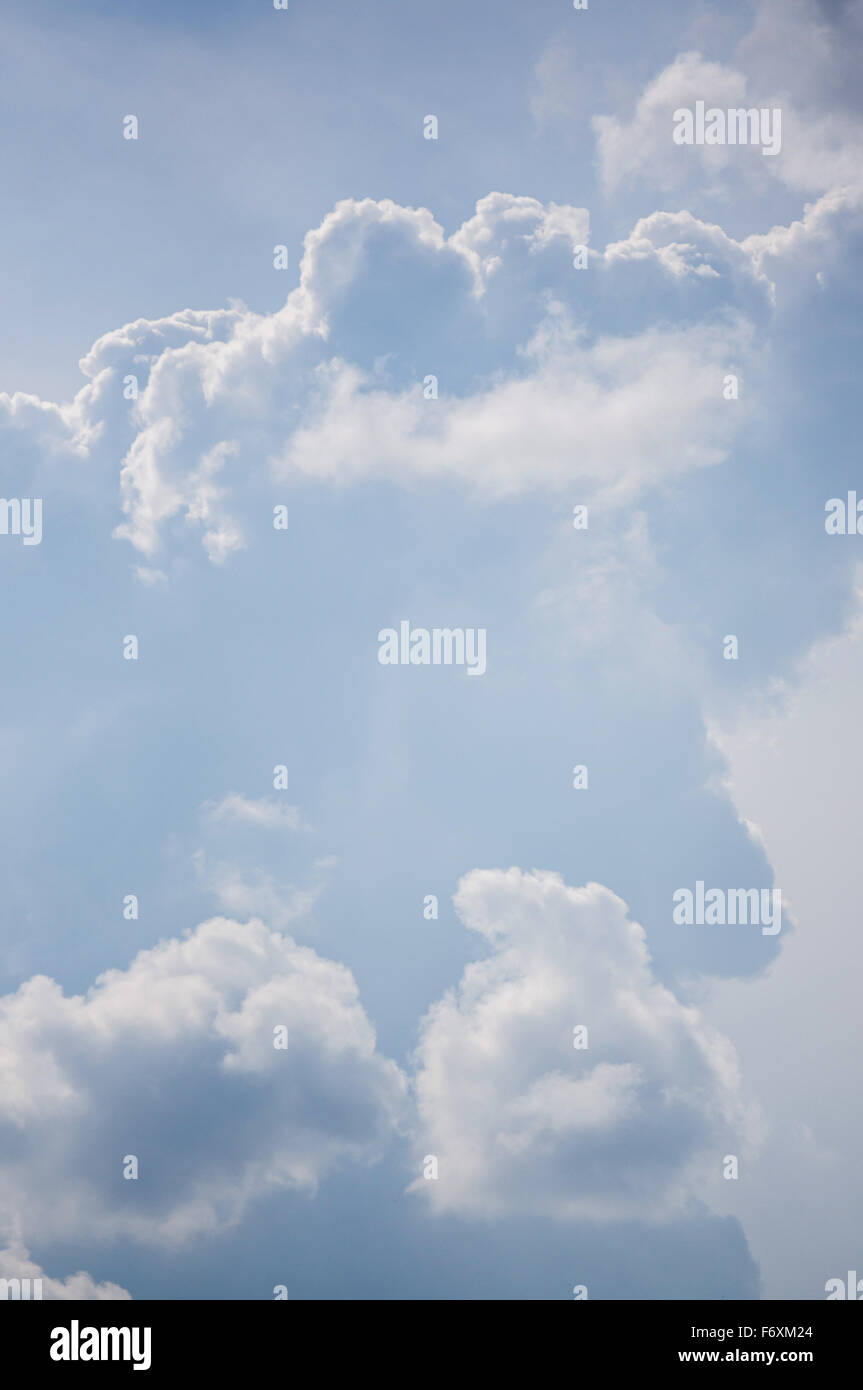 Clouds in a blue sky Stock Photo - Alamy
