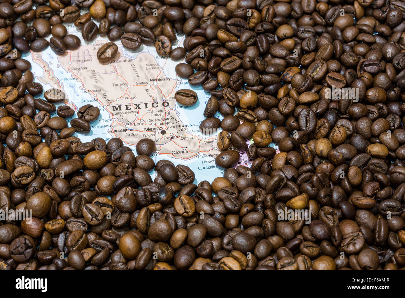 Geographical map of Mexico covered by a background of roasted coffee ...