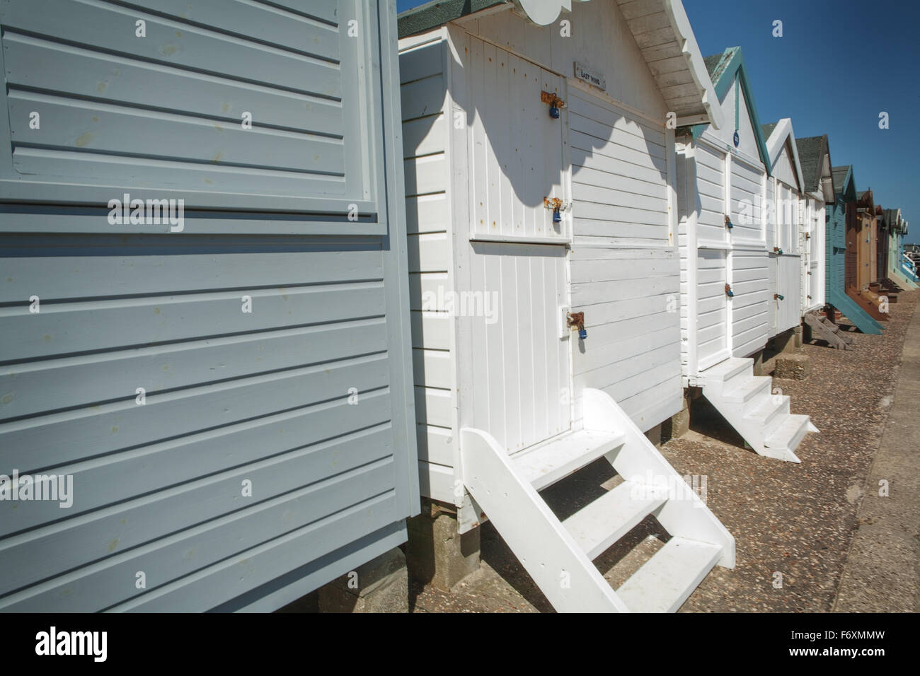 Row of beach huts at Frinton seafront, England Stock Photo - Alamy