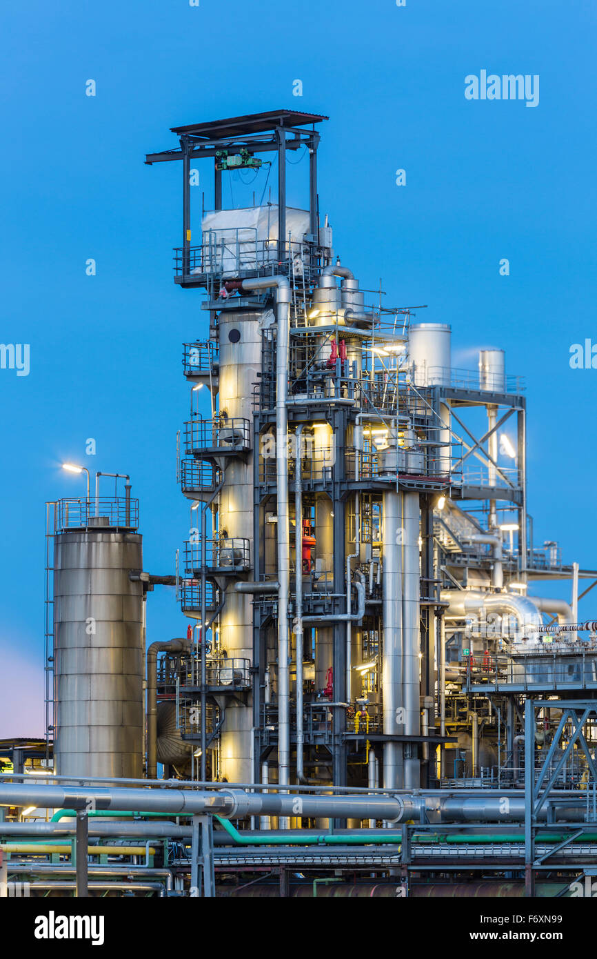 Detail of distillation towers in a chemical plant and refinery with ...