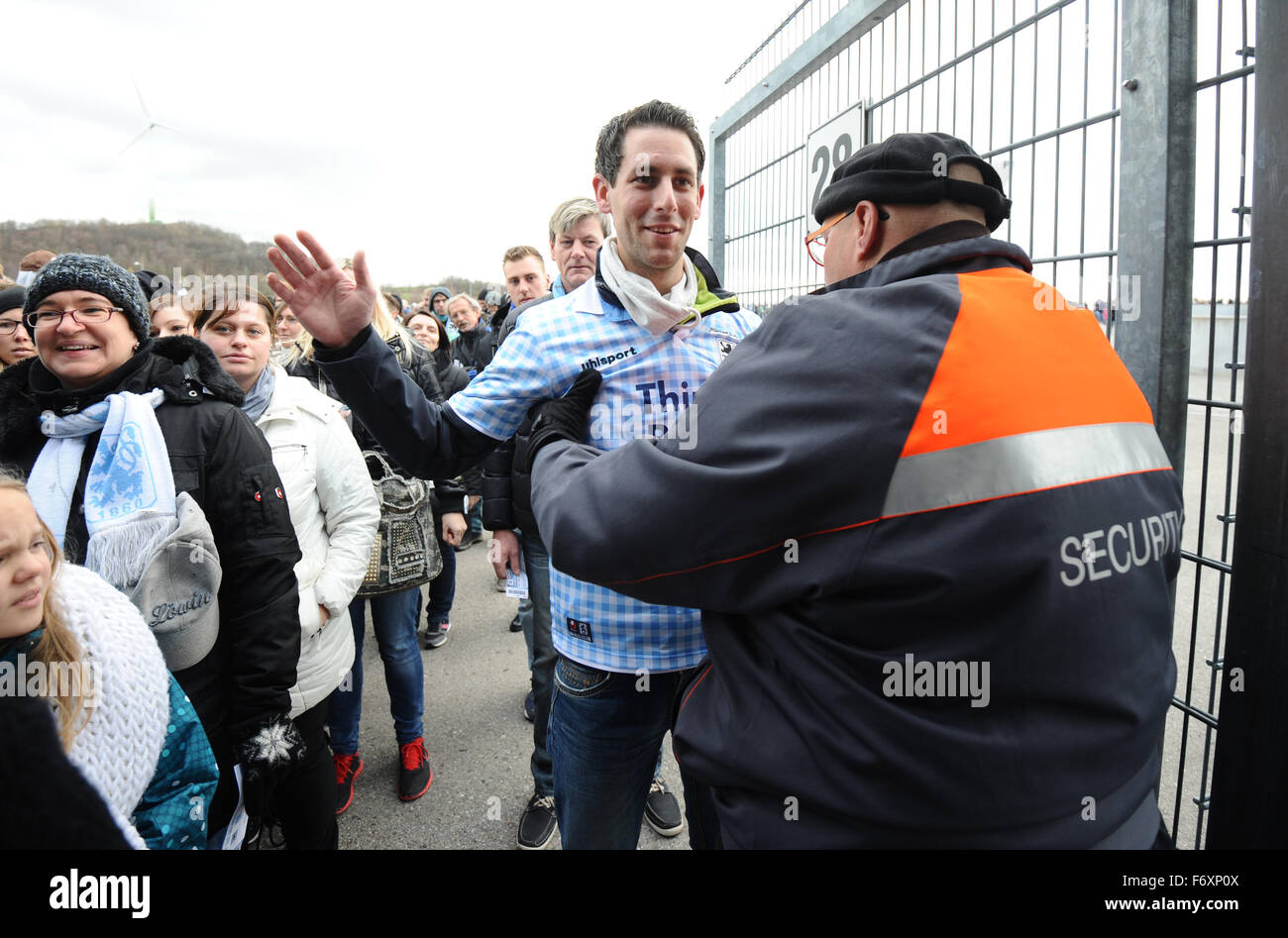 Munich, Germany. 21st Nov, 2015. Security staff pat down fans at the ...