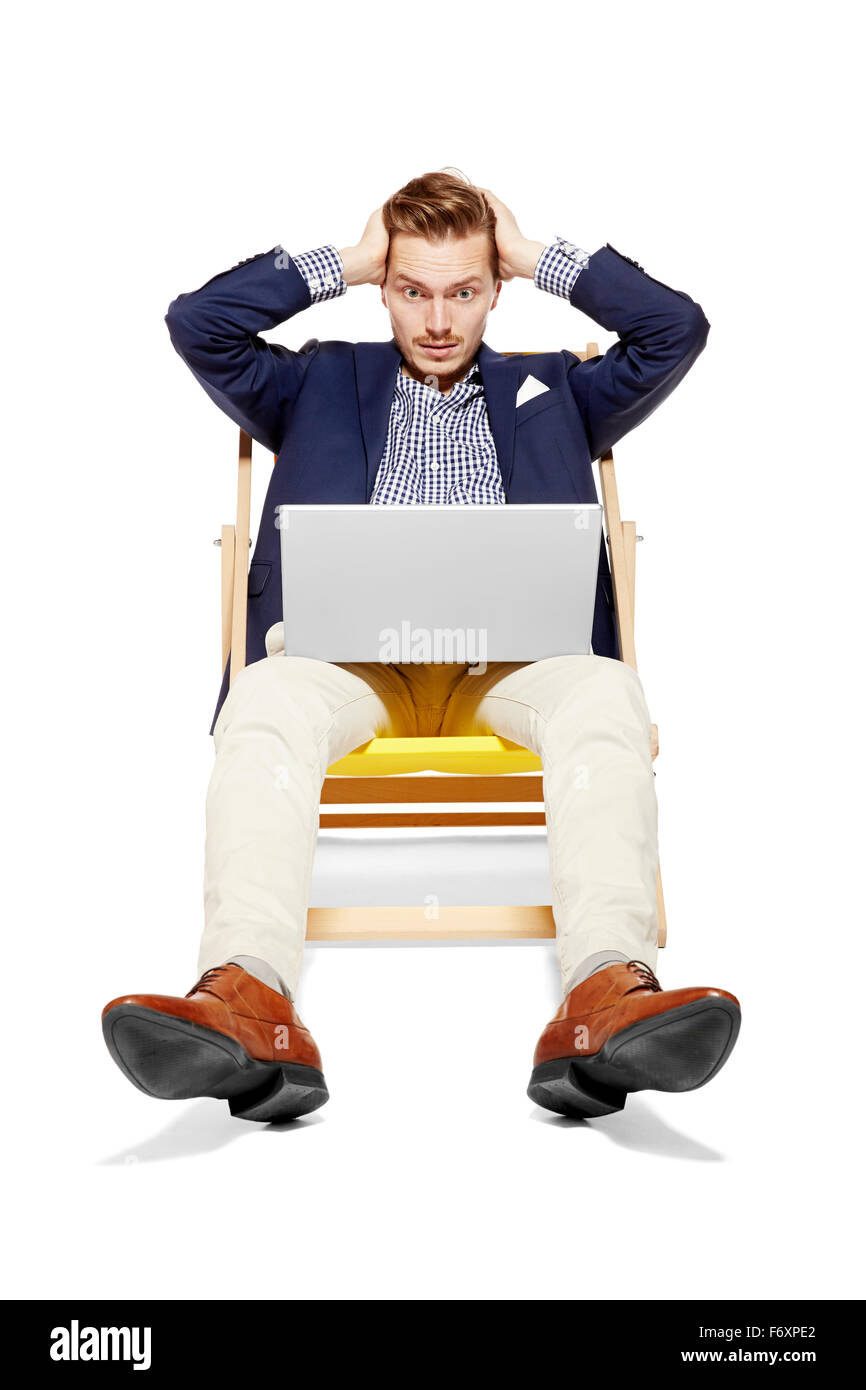 Man has problems at work. Making a big eyes and gesturing by hands ...