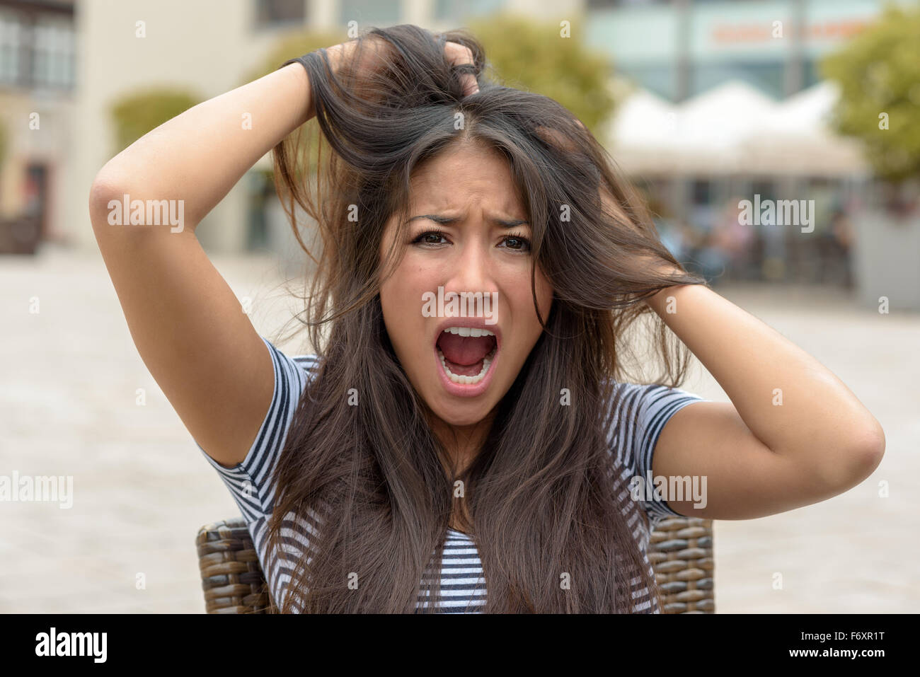 Woman frantic street hi-res stock photography and images - Alamy