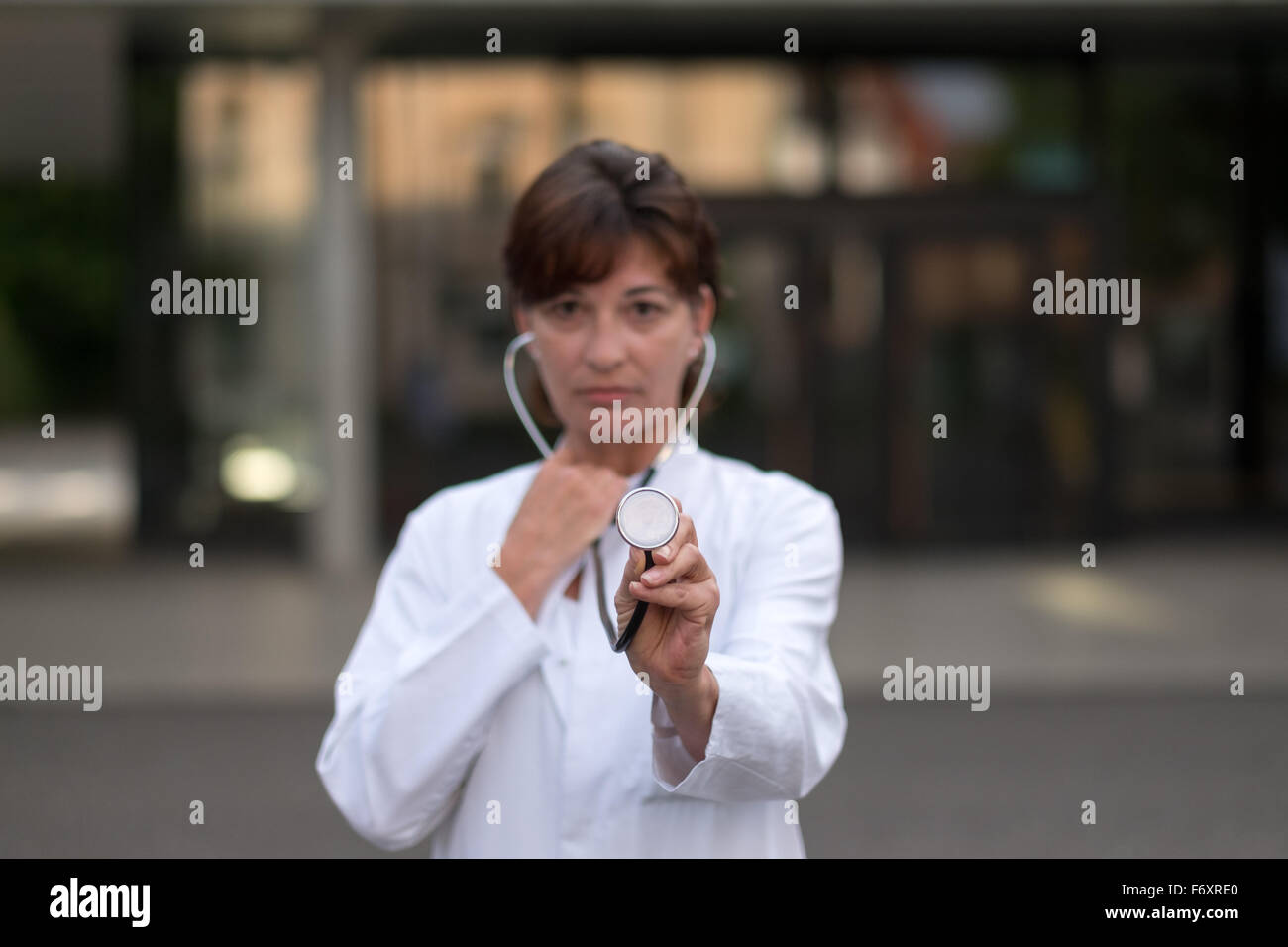 Half Body Shot of a Young Female Medical Doctor with Stethoscope ...