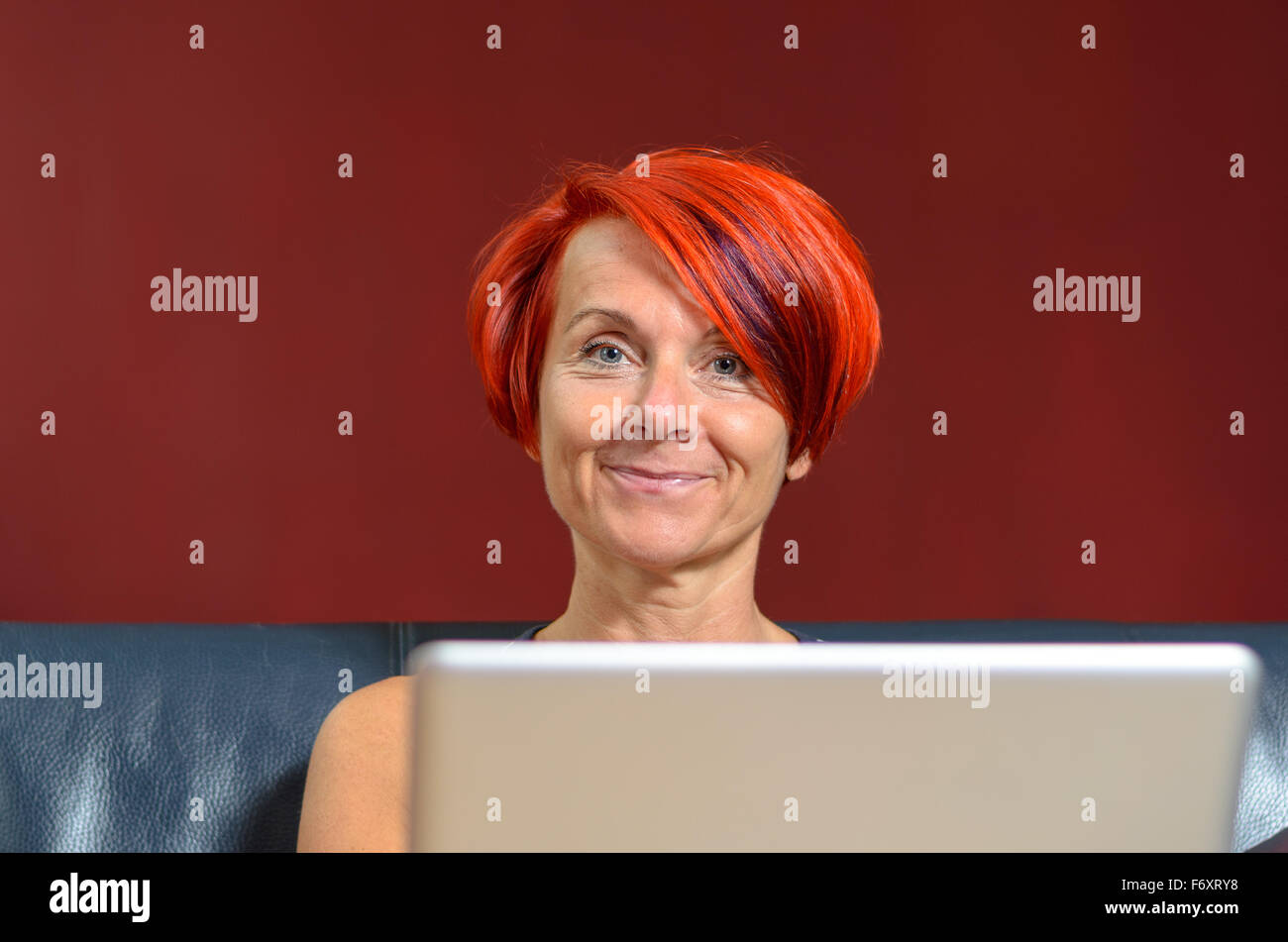 Close Up Pretty Adult Woman With Red Orange Hairstyle Sitting On The