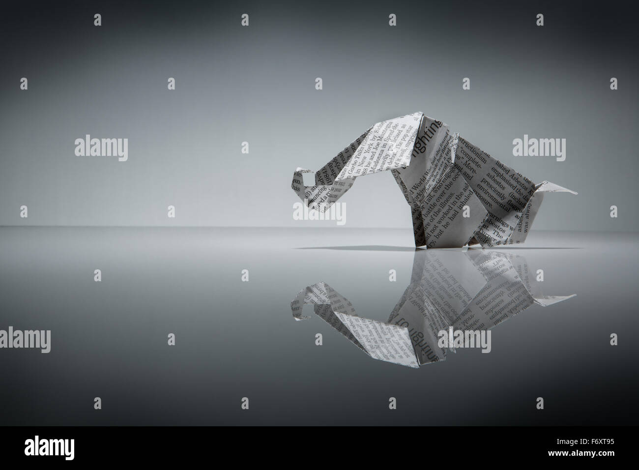 Still life image of a origami elephant make from news paper Stock Photo ...