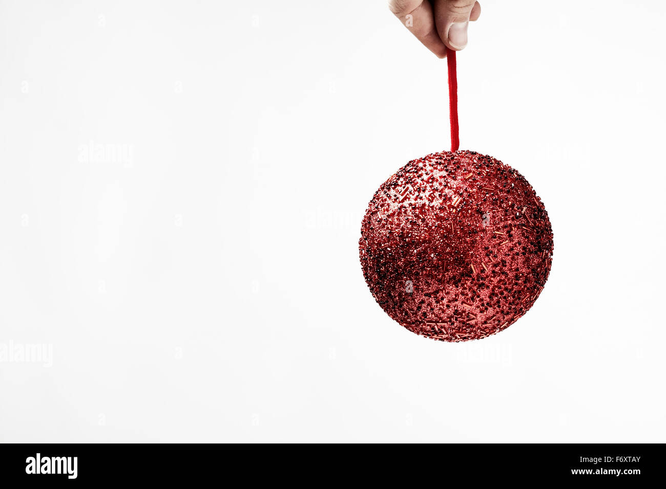 Christmas ball hanging on ribbon hi-res stock photography and images ...