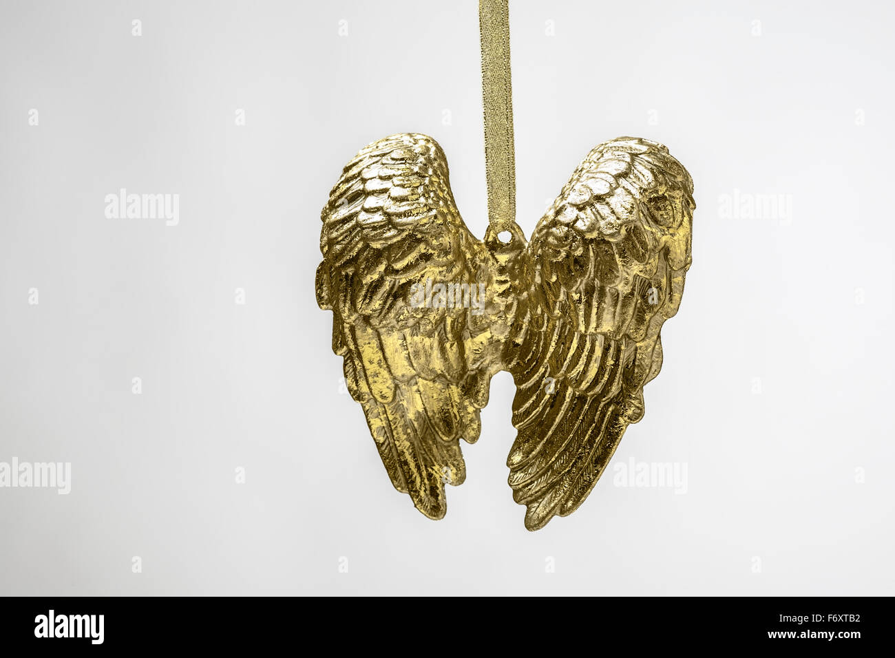 angel wings christmas hanging decoration for a tree Stock Photo - Alamy