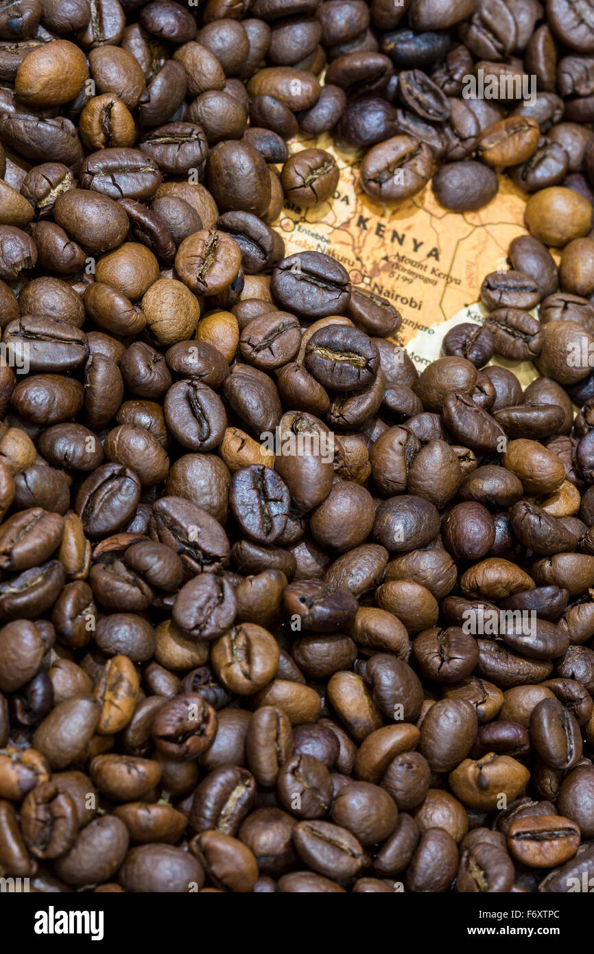 Vintage map of Kenya covered by a background of roasted coffee beans ...