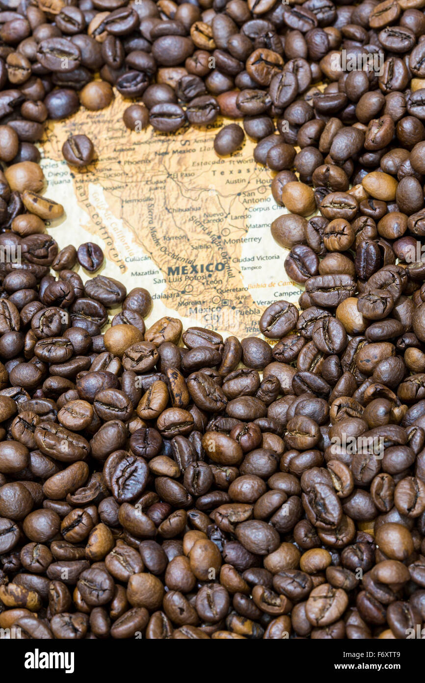 Vintage map of Mexico covered by a background of roasted coffee beans ...