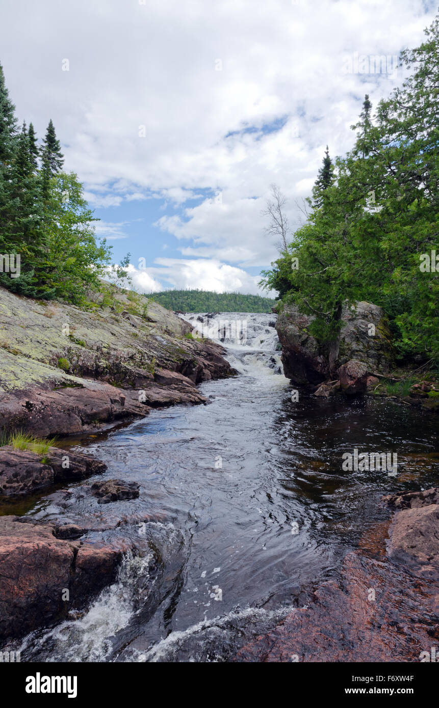 Cascading water over rocks in Black Beaver Falls in Agawa Canyon Stock ...