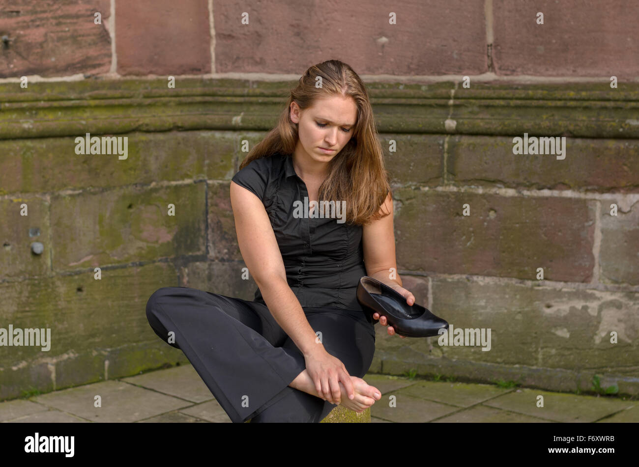 Woman Aching Feet High Resolution Stock Photography and Images - Alamy