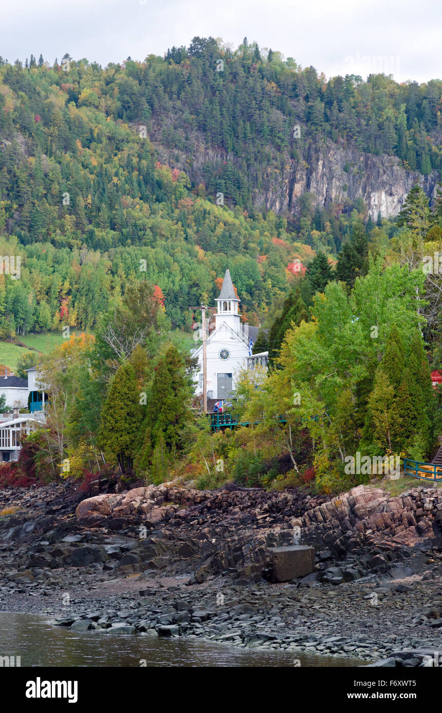 Beautiful homes on hillside surrounded by colorful autumn foliage Stock ...