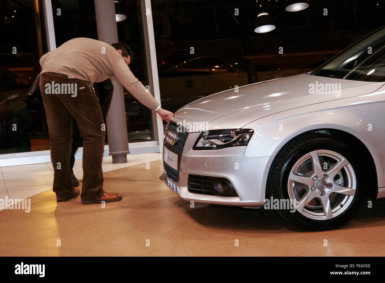 Presentation new model Audi car dealership Stock Photo - Alamy