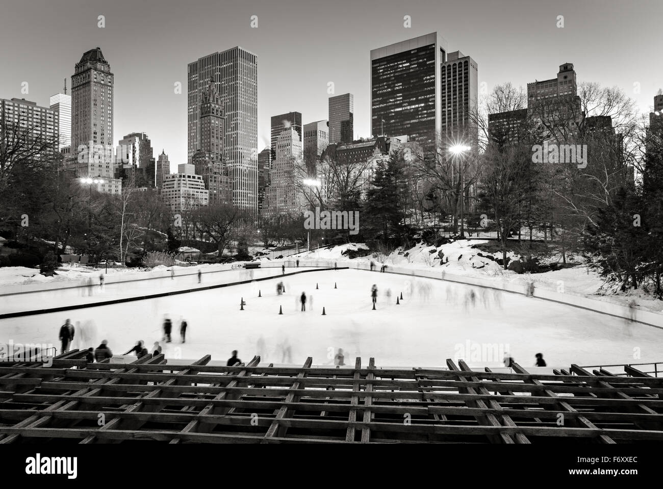 Central Park Ice skating, Wollman Rink, with Midtown Manhattan ...