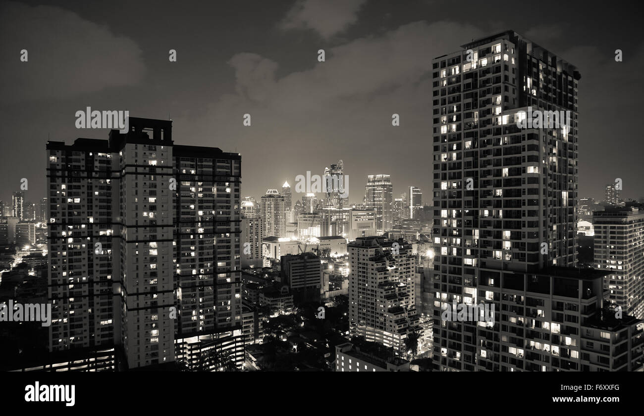 Cityscape night scene of capital city center. Condominiums, towers, and ...