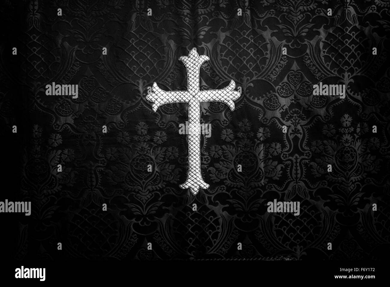 embroidered religious cross on fabric background detail Stock Photo - Alamy