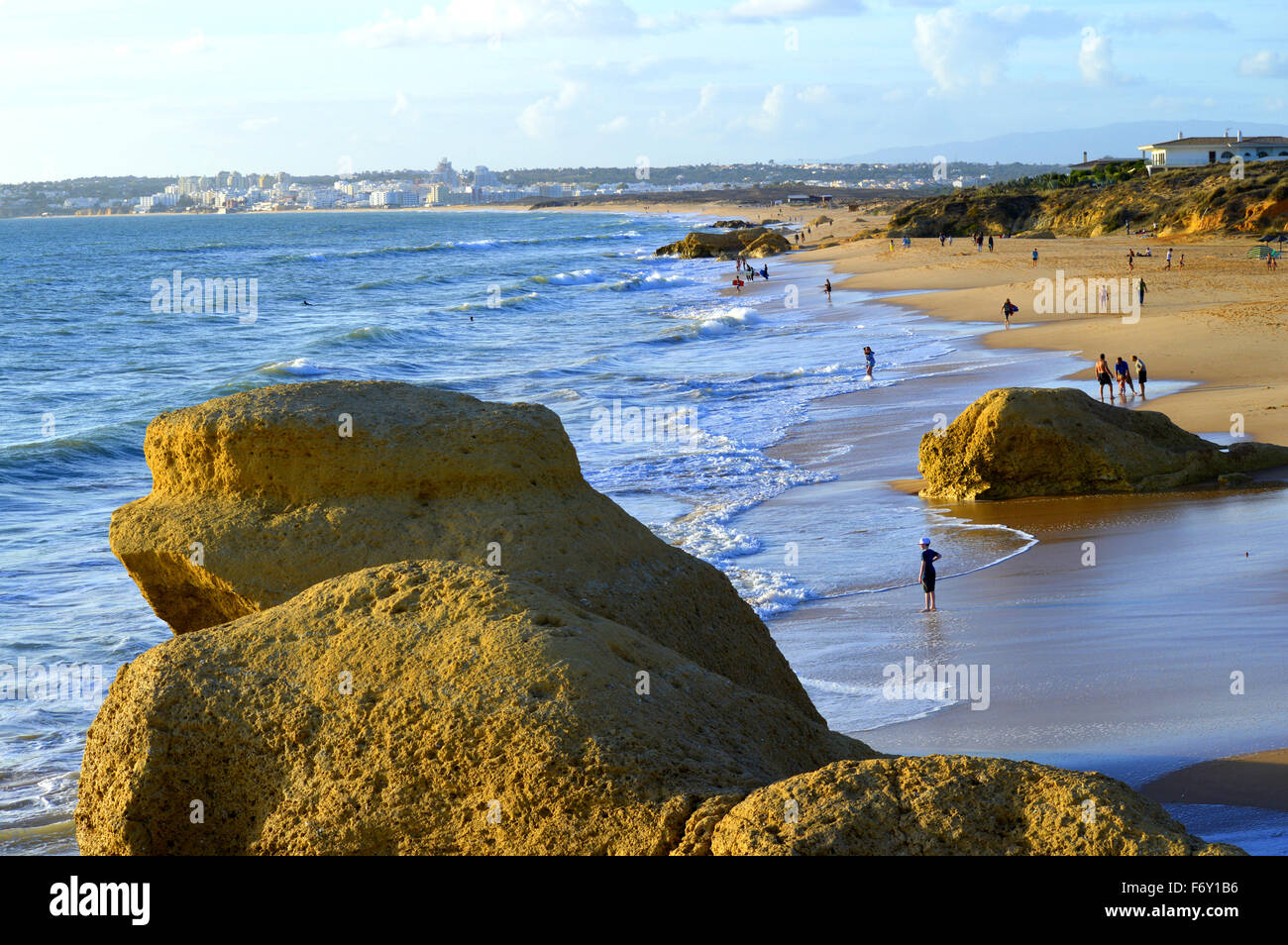 Tourists enjoying the late evening sun on Praia Da Gale Beach Stock ...